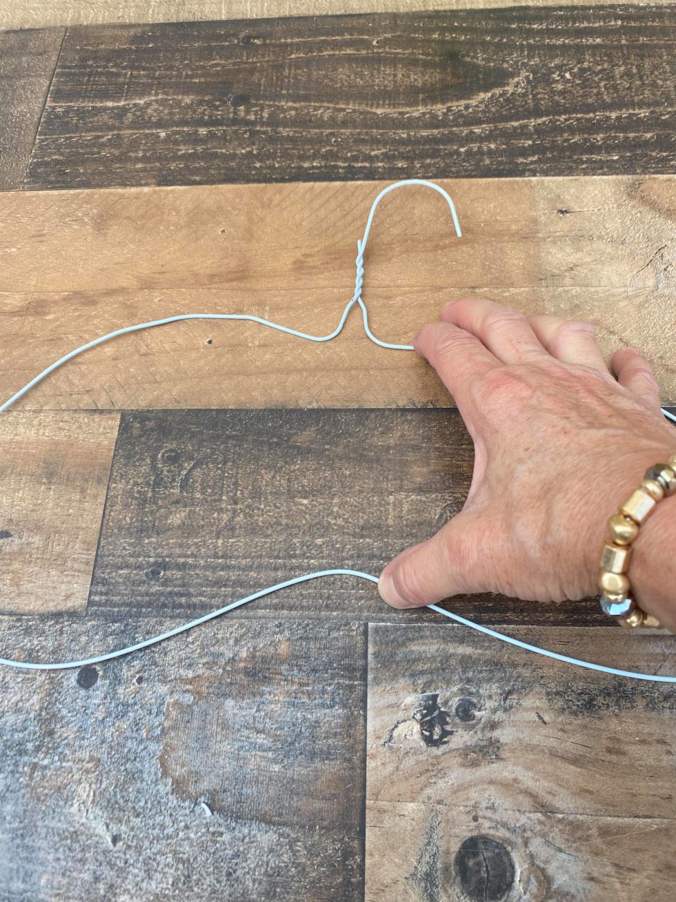 DIY Angel Wings Made From A Wire Hanger - The Shabby Tree